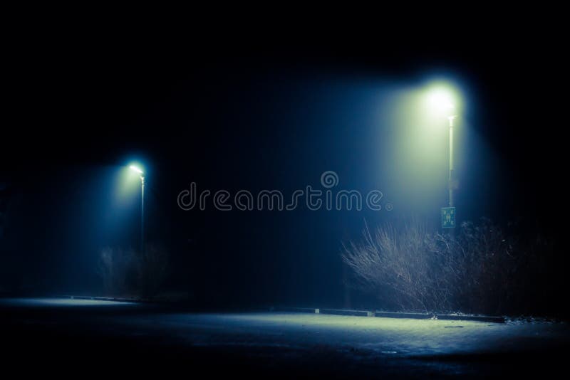 Spooky Scenery with Street Lights in the Fog Stock Photo - Image of ...