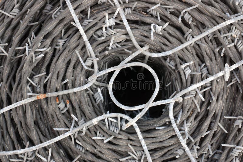Spool of barbed wire stock photo. Image of sharp, metal - 22527594