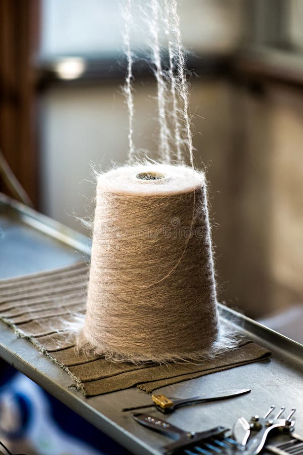 Spool of Brown Thread on Industrial Sewing Machine Stock Photo - Image ...