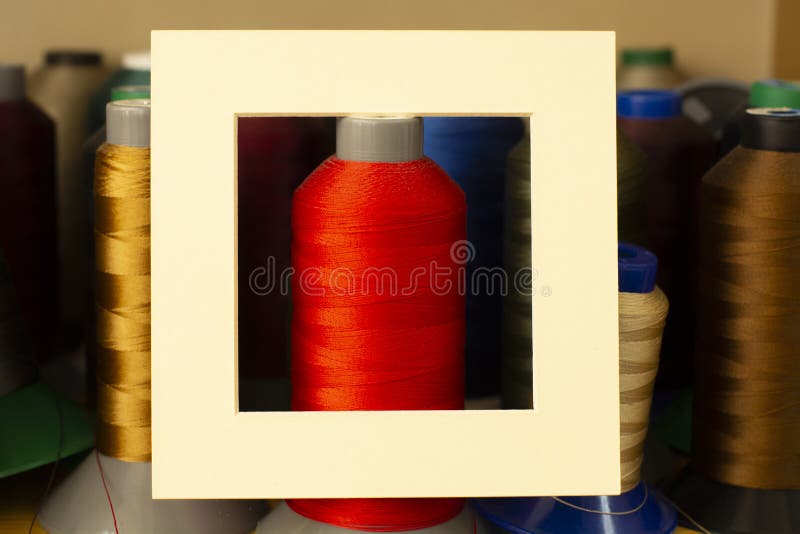 A Spool of Colorful Threads in a Frame. Sewing Thread. Shoe Industry ...