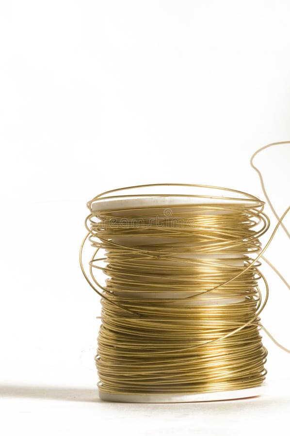 Spool of gold stock image. Image of bind, golden, wire - 4999407