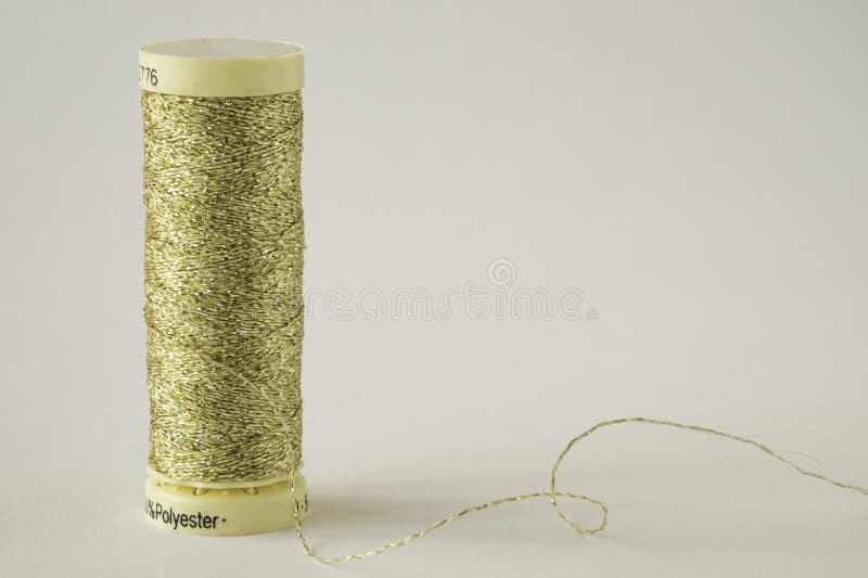 Spool of gold stock image. Image of bind, golden, wire - 4999407