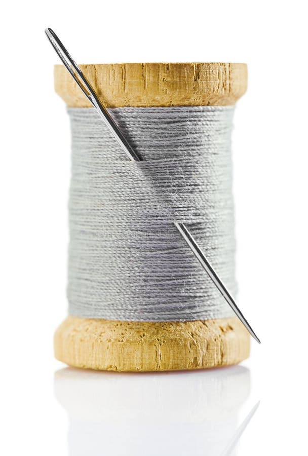 Spool With Gray Thread And Nidle Stock Image - Image: 25200759