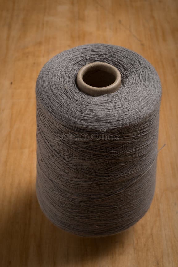 A Spool of Grey Thread stock photo. Image of spool, embroidery - 68653552