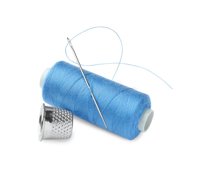 Spool of Light Blue Sewing Thread with Needle and Thimble on White ...