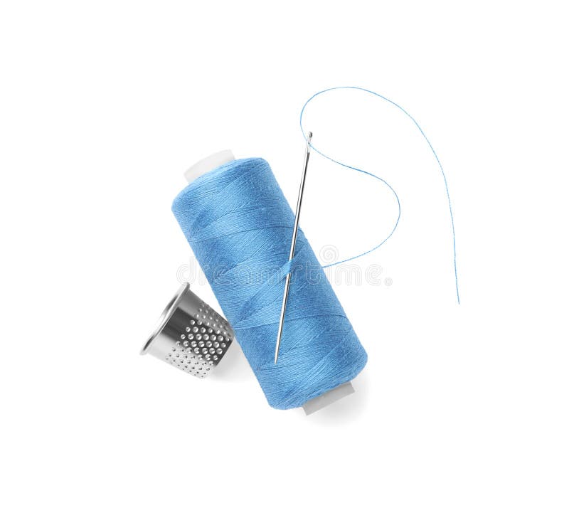 Spool of Light Blue Sewing Thread with Needle and Thimble on White ...