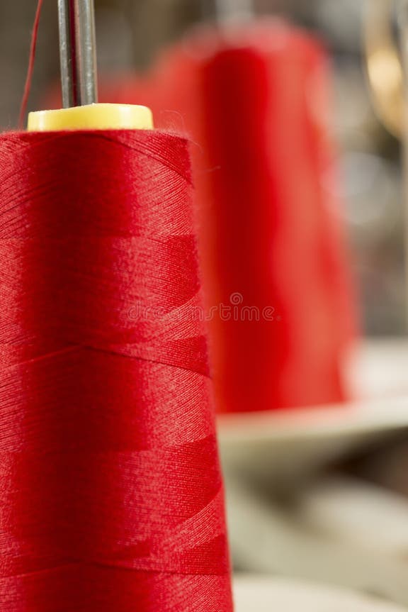 Spool of Red Thread on Sewing Machine Pin Stock Image - Image of roll ...