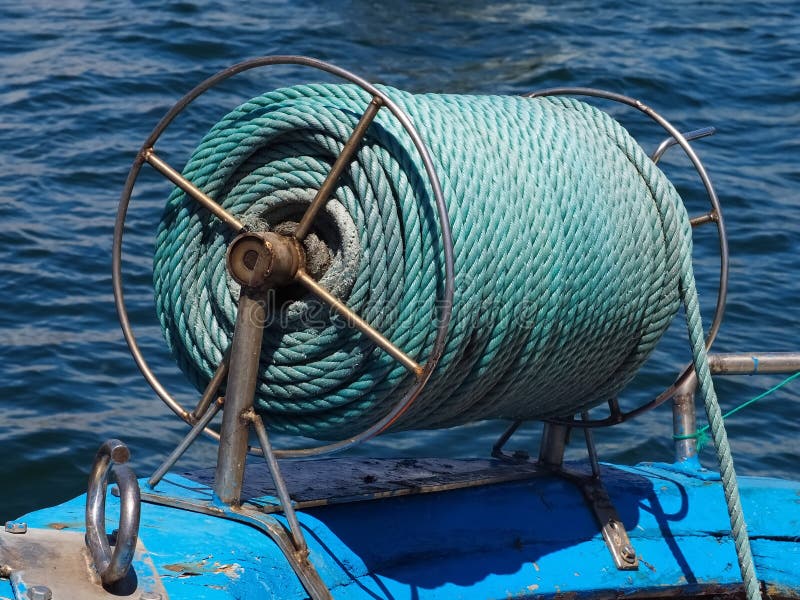 Spool with a Blue Rope To Catch Fish on an Boat Stock Photo - Image of ...