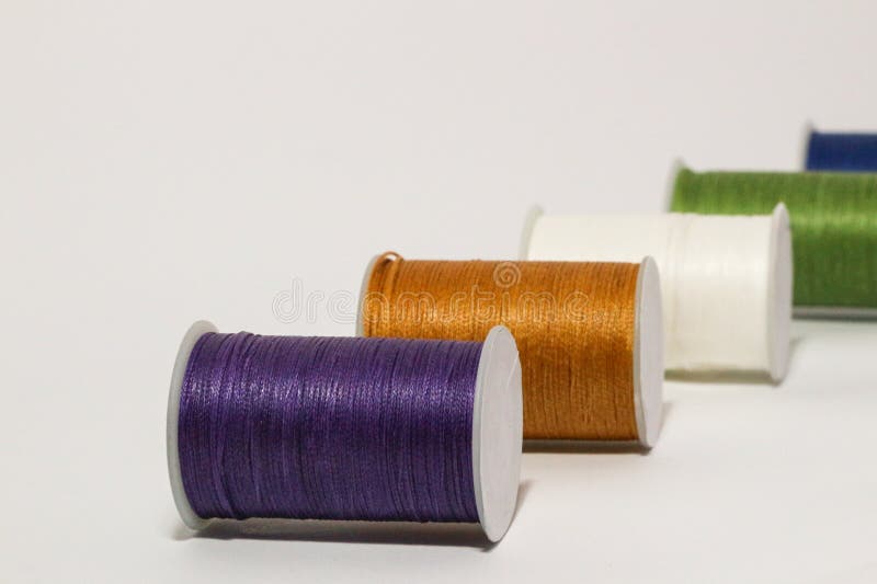 Spool of sewing thread stock image. Image of material - 318581003