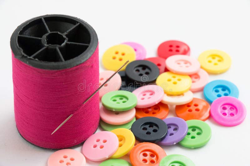 Spool of Thread and Buttons, Sew Instrument on White Ba Stock Image ...
