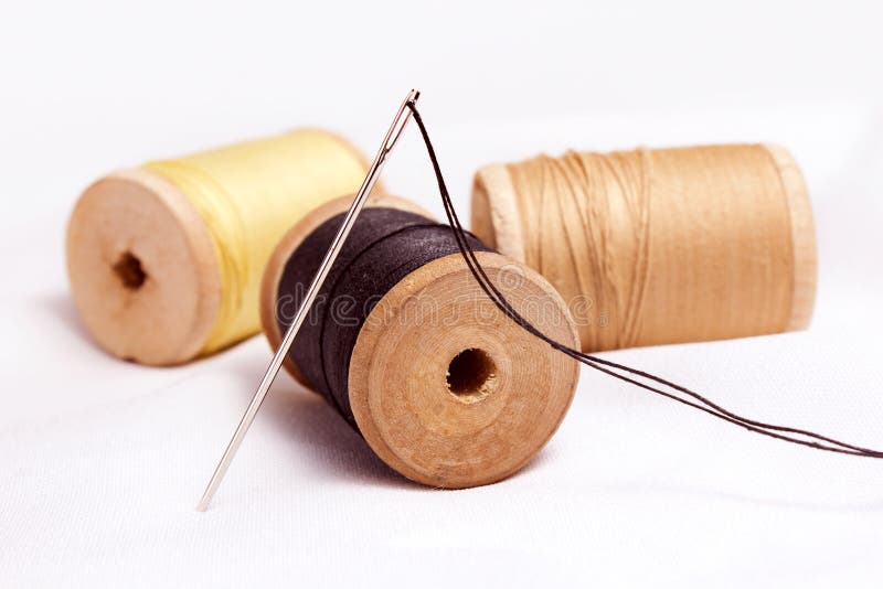 Spool of Thread and Needle. Stock Photo - Image of hobby, dressmaker ...