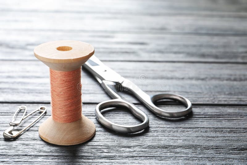 Spool of Thread, Scissors and Pins Stock Photo - Image of dressmaking ...