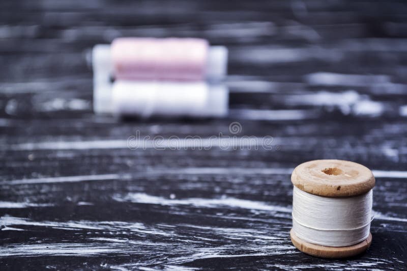 The Spool of Thread on the Table. Thread on a Reel for Craft. Ma Stock ...
