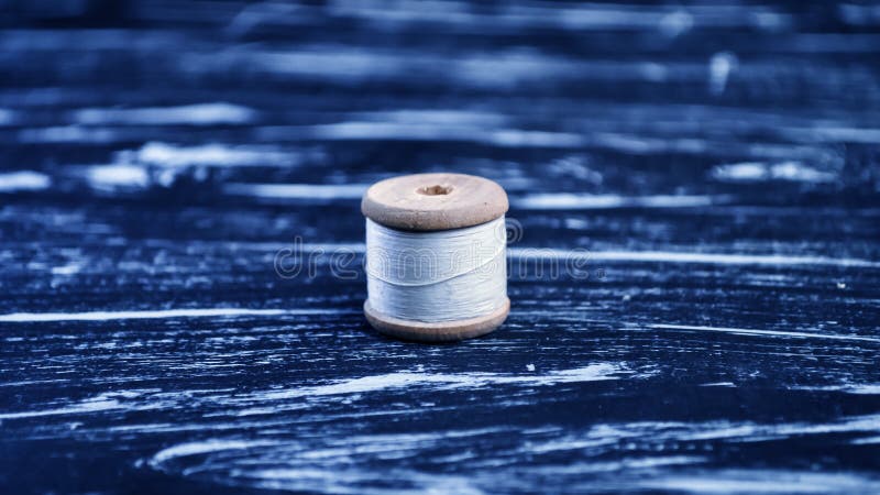 The Spool of Thread on the Table. Thread on a Reel for Craft. Ma Stock ...