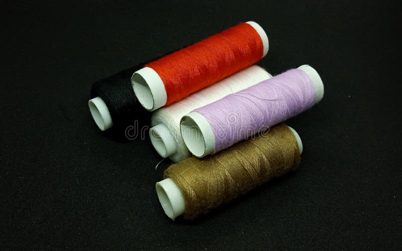 Spool Threads Isolated on the Black Background. Stock Image - Image of ...