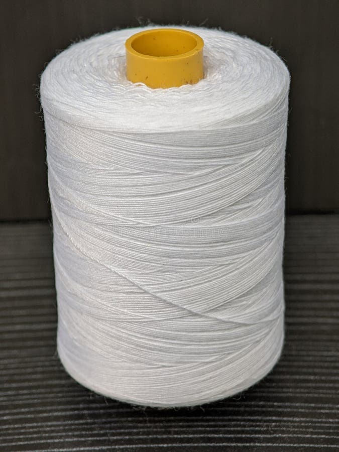 A Spool of White Thread Isolated on Black Background Stock Image ...
