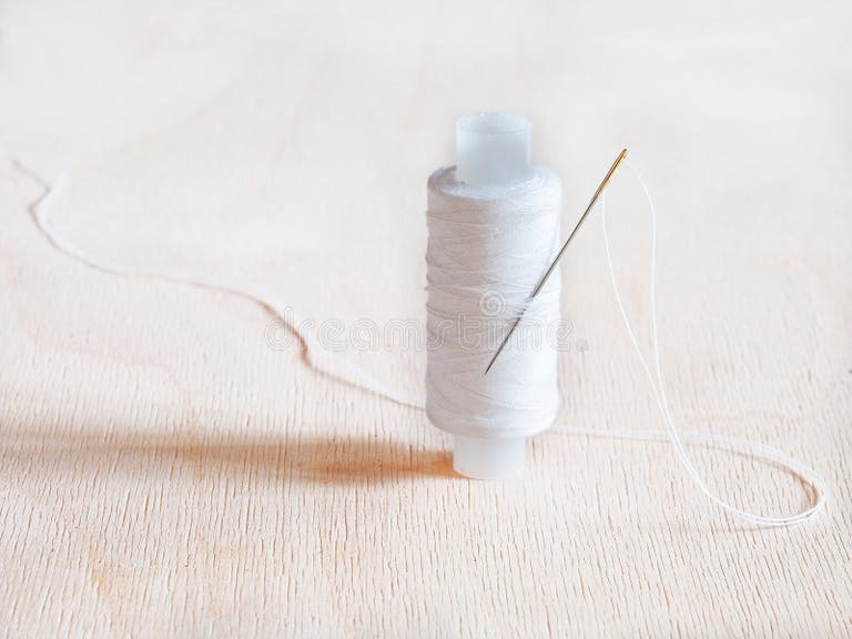 Spool with White Thread and with a Needle Stock Image - Image of wood ...