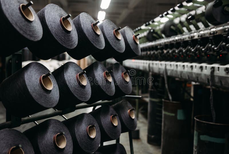 Spools of Black Cotton Thread on a Stand Near the Production Line Stock ...