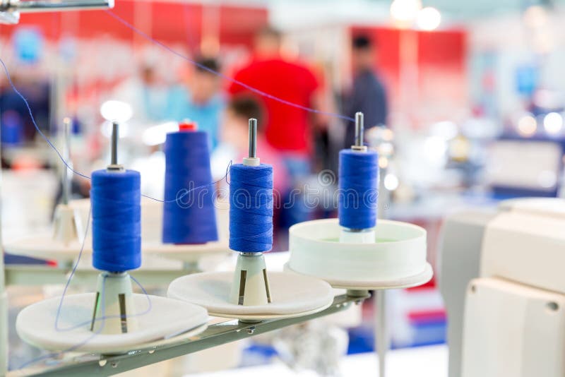 Spools of Blue Threads on Sewing Machine, Closeup Stock Image - Image ...