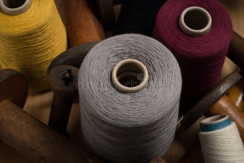 Spools of Color Thread with Empty Wooden Spools Stock Image - Image of ...