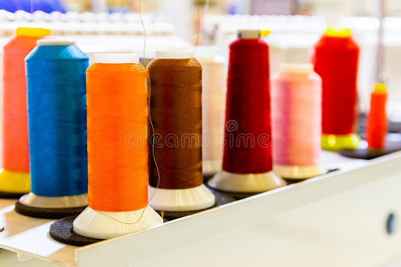 Spools of Colored Thread on an Industrial Sewing Machine Stock Photo ...