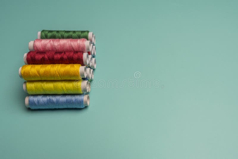 Spools of Multi Colored Sewing Thread Stacked Stock Photo - Image of ...