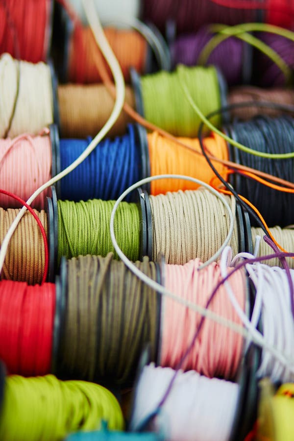 Spools with Rope of Different Colors for Sewing or Crafting on a Market ...