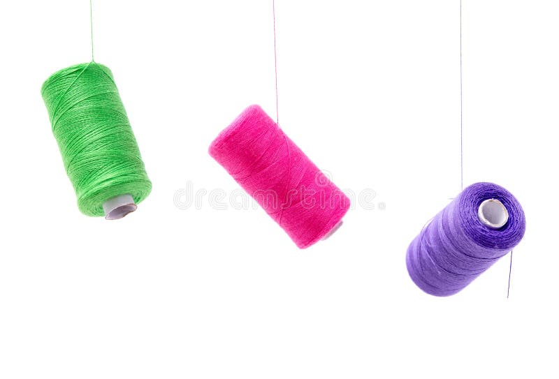 Spools of Sewing Cotton Floating Stock Photo - Image of variety ...