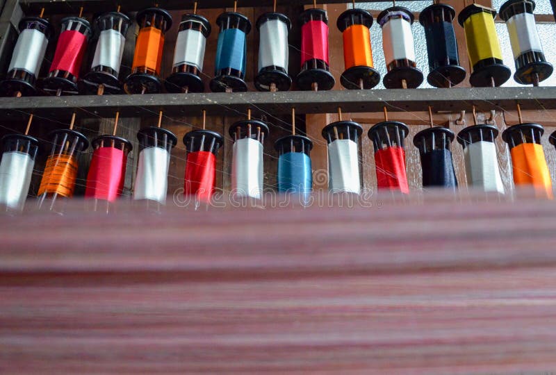 Spools of silk threads stock photo. Image of processing - 79710548