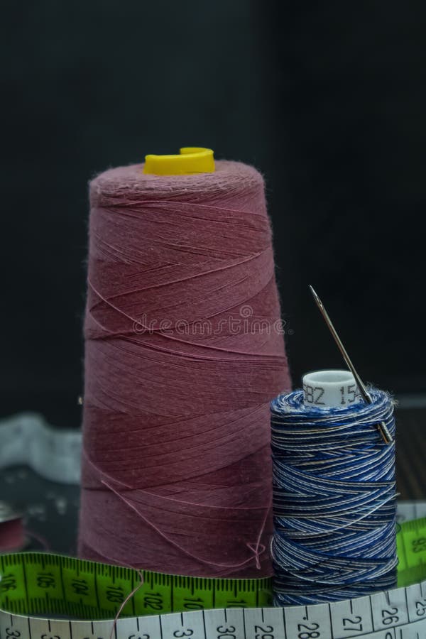 Spools of Thread in the Black Background. Stock Image - Image of purple ...
