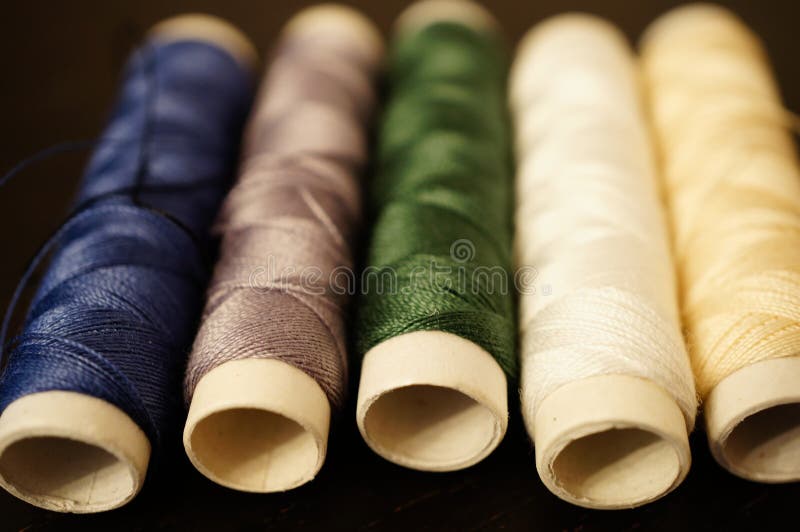 Spools of thread stock image. Image of sewing, yellow - 37028011