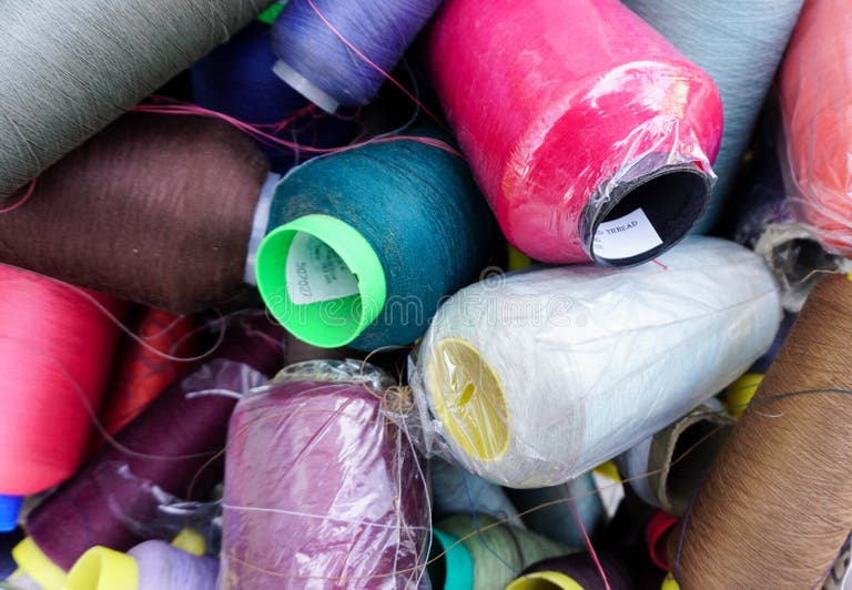 Spools of thread in a pile stock photo. Image of curtain - 80816312
