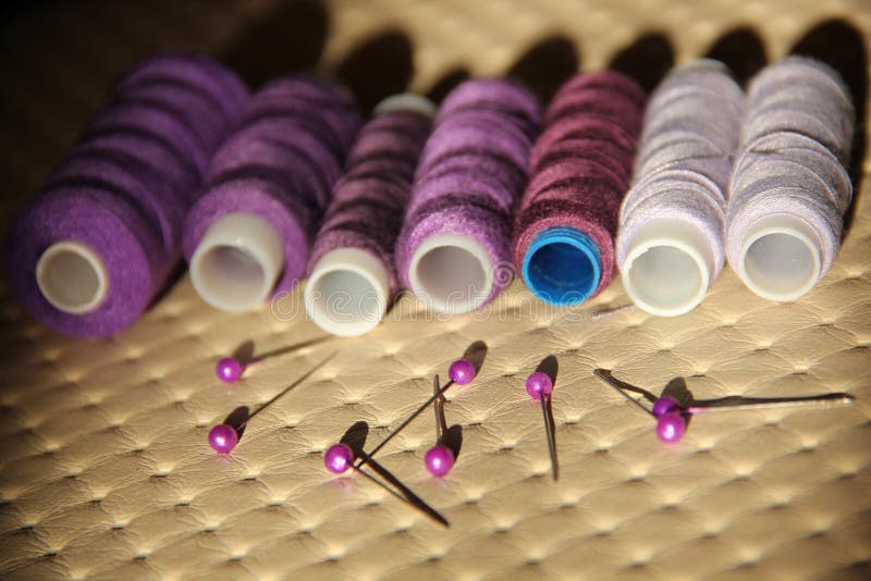 Spools of thread and pins stock photo. Image of sewing - 83615150