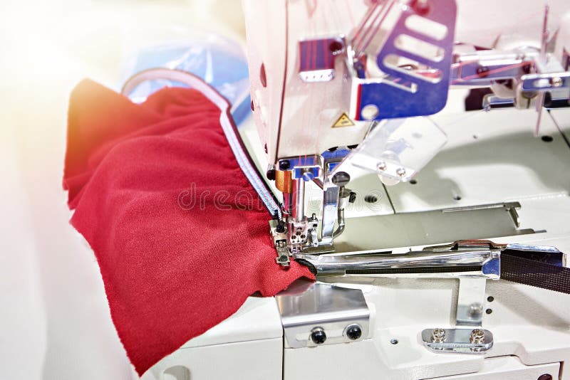 Spools of Thread and Sewing Coverstitch Machine Stock Photo - Image of ...