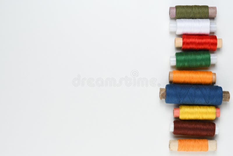 Spools of thread on table stock image. Image of bright - 139325359