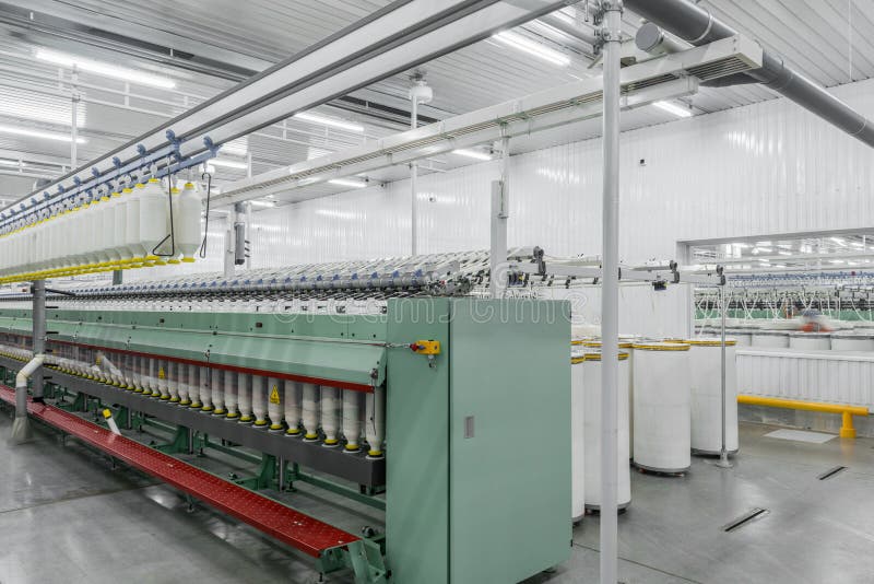 Spools of Thread at a Textile Factory Stock Photo - Image of sewing ...