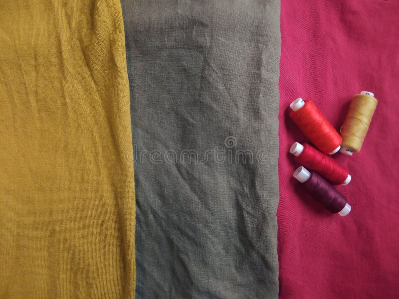 Spools of Thread on Textile Linen Wool Cotton Background Stock Photo ...