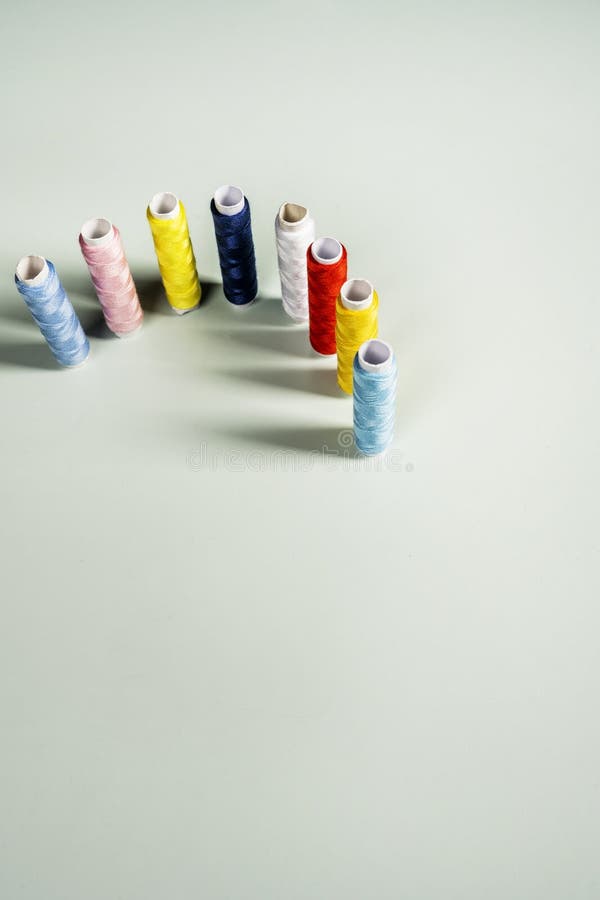 Red Unused Thread Spool on a Full Black Background Stock Photo - Image ...