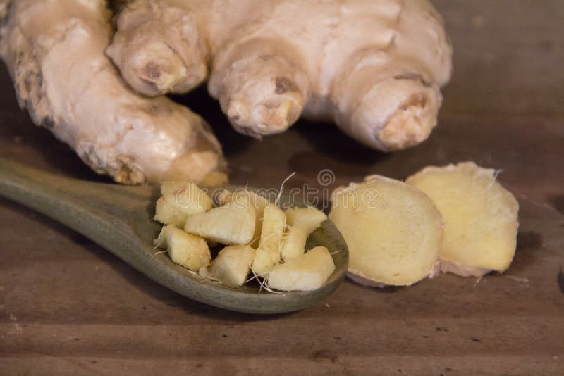 Chopped Ginger Root with Cutting Block and Knife Stock Photo - Image of ...