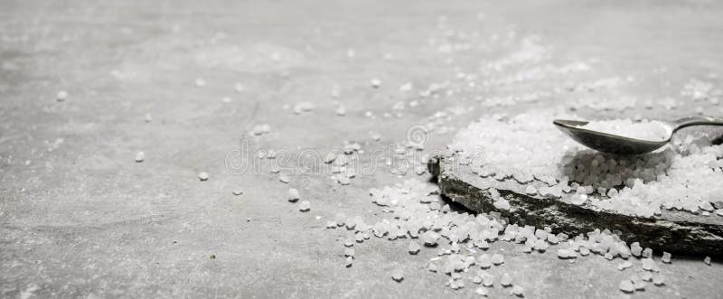 Spoon Coarse Salt. on Stone Background. Stock Image - Image of heap ...