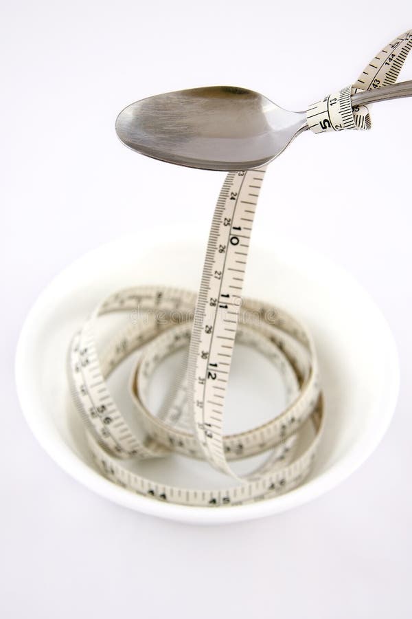 Spoon Connected To Measuring Tape Stock Photo - Image of small, tiny ...