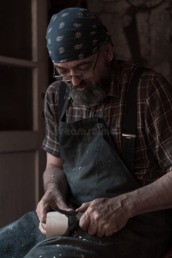 Spoon Craft Master in His Workshop with Handmade Wooden Products and ...