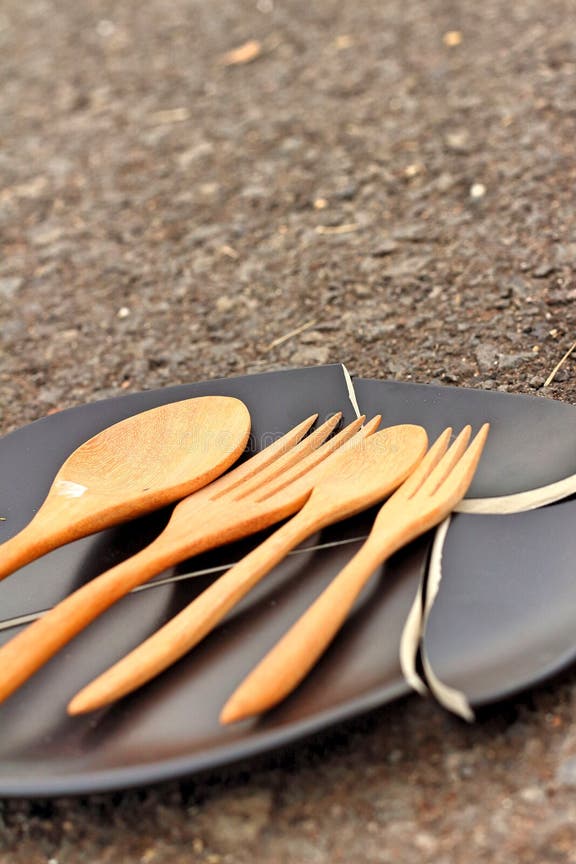 Spoon and Fork on a Crack Black Plate. Stock Image - Image of concept ...