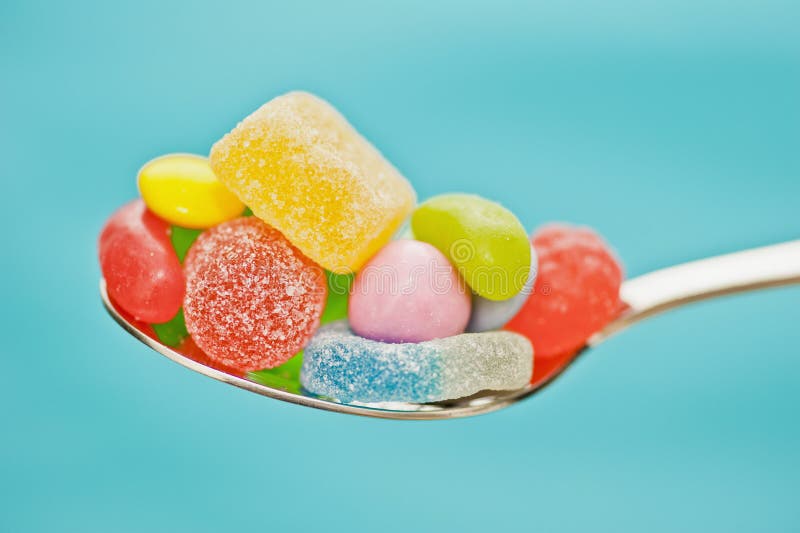 Spoon full of candy stock image. Image of horizontal - 21159283