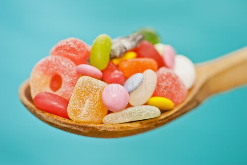 Spoon full of candy stock image. Image of horizontal - 21159283