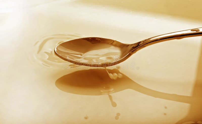 Spoon full of milk stock photo. Image of diary, dairy - 14732986