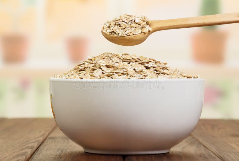 Spoon Gaining Oatmeal in Bowl Stock Image - Image of bowl, cooked: 63682037