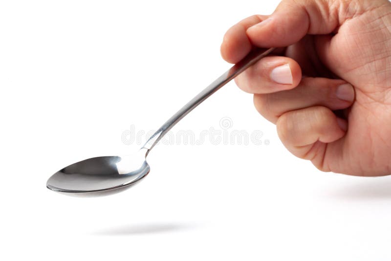 Spoon in a Hand on White stock image. Image of lunch - 169568499