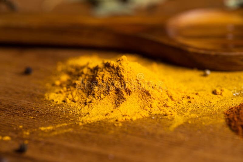 Spoon and Heap of Spices on the Table Stock Photo - Image of cinnamon ...