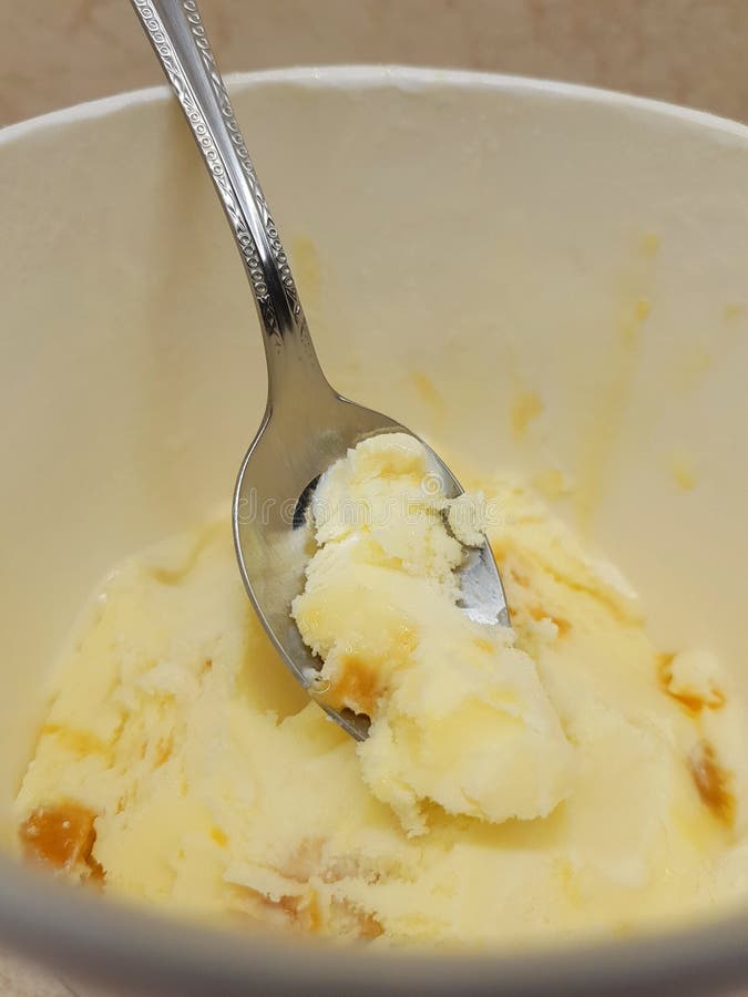 Spoon in ice cream stock image. Image of creamy, icecream - 136075789